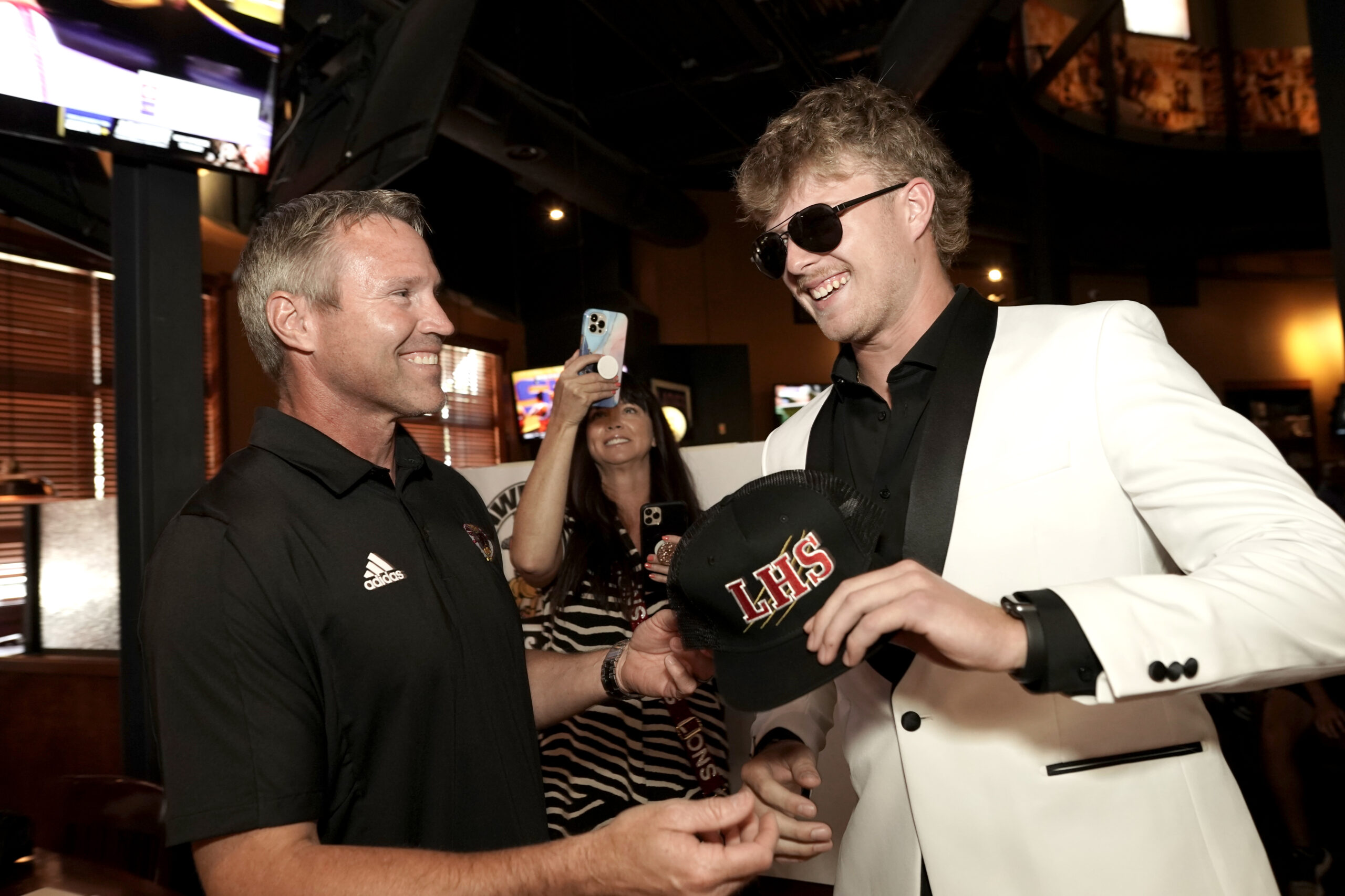 Lawrence High football’s summer draft brings players together while ...